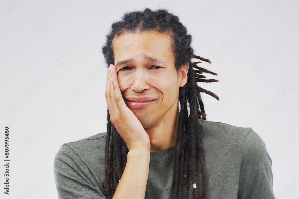 Crying, portrait and sad man in studio with anxiety, worry and broken ...