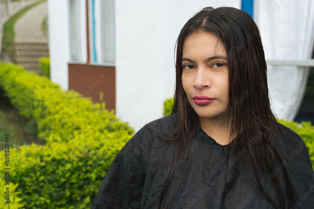 Beautiful latina woman with dark hair and red lips ready to cut her ...