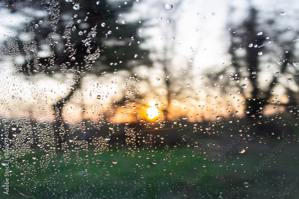 Close up and macro view of raining water drop on clear transparent ...