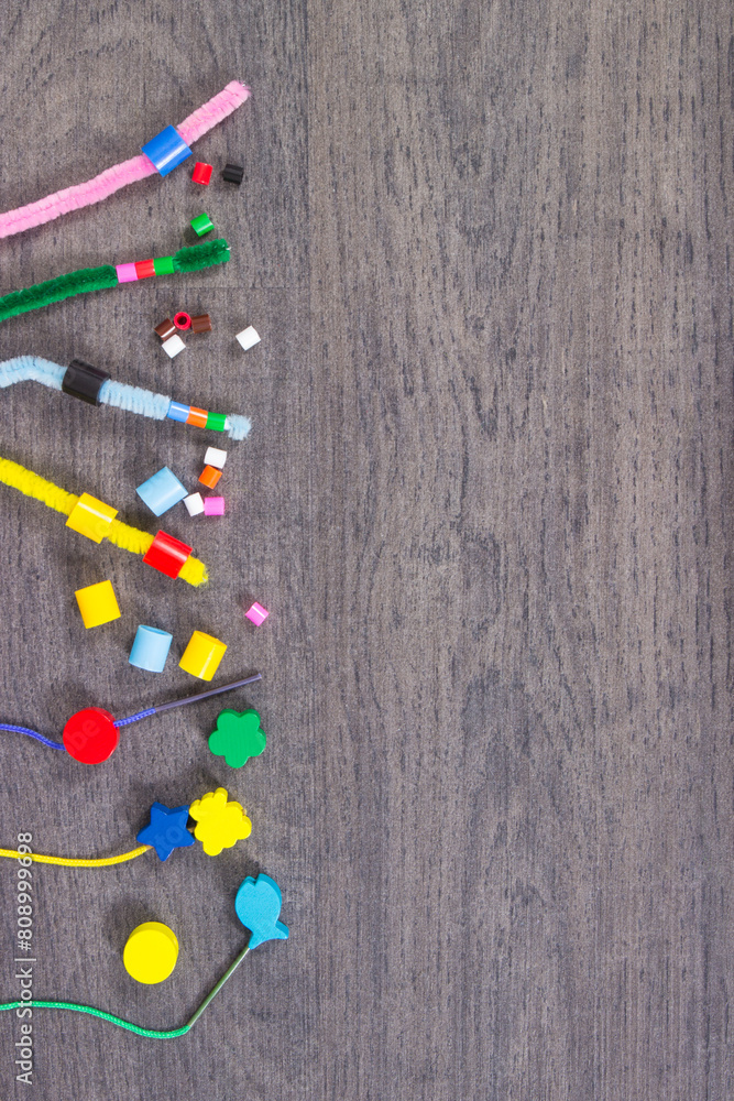 Thread, creative sticks and beads used to making bracelets, learn ...