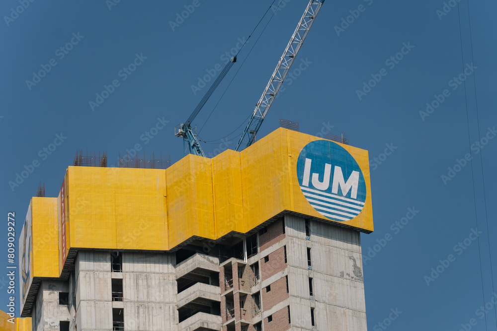 PENANG, MALAYSIA - APRIL 05, 2024: IJM logo displayed on the unfinished ...
