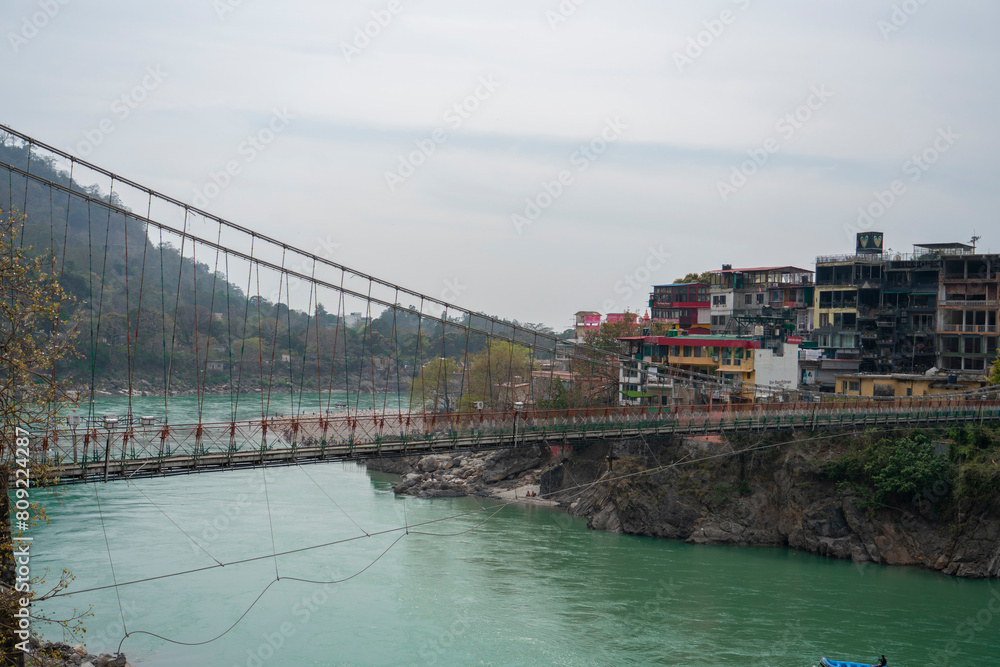 Rishikesh, India, March 2024. View of Ganga river embankment and ...