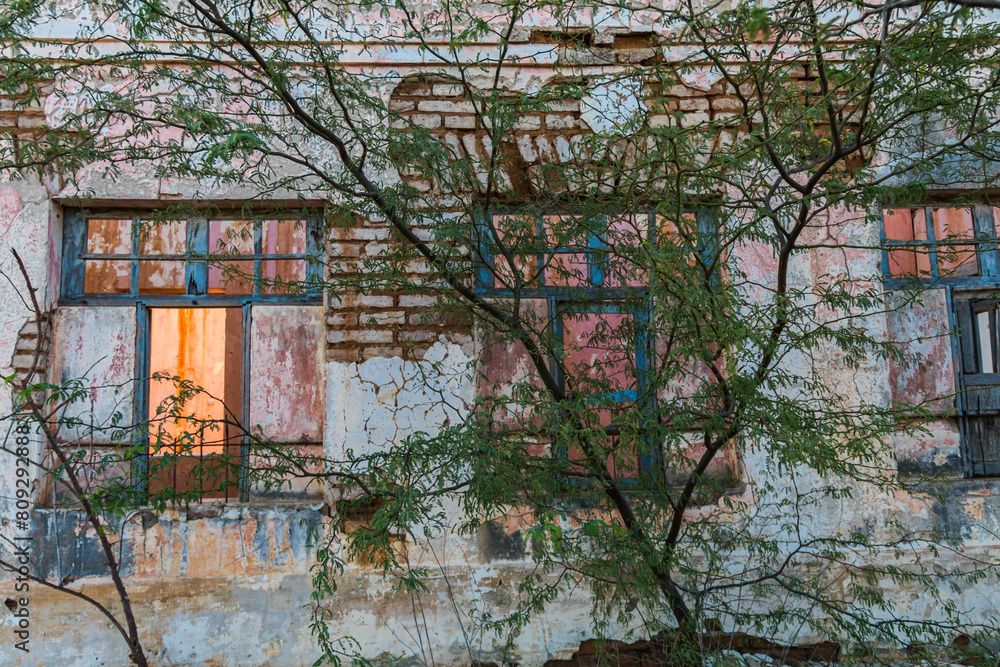 Sunset with abandoned house of traditional architecture in ruins ...