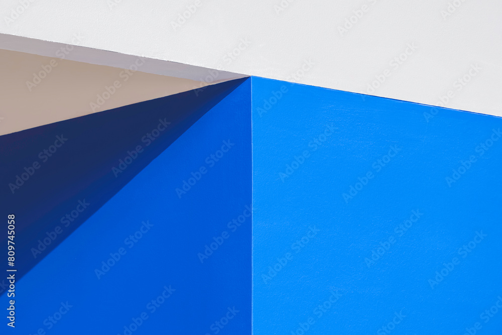 Light and shadow on the corner of blue interior prefabricated fiber ...
