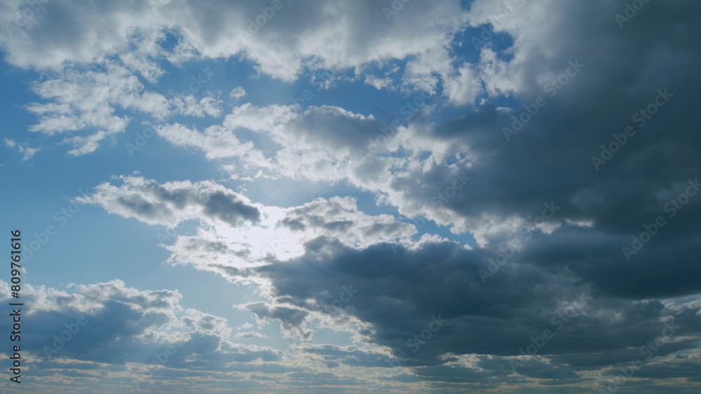 Solar energy concept of bright sun ray. Building clouds and sun rays ...