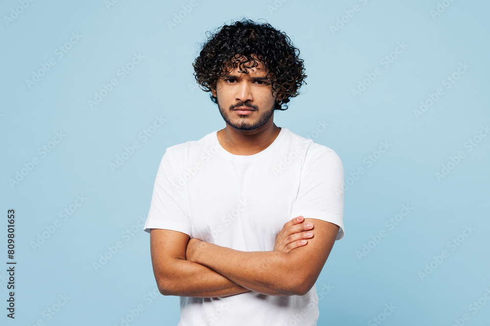 Young sad disappointed Indian man he wearing white t-shirt casual ...