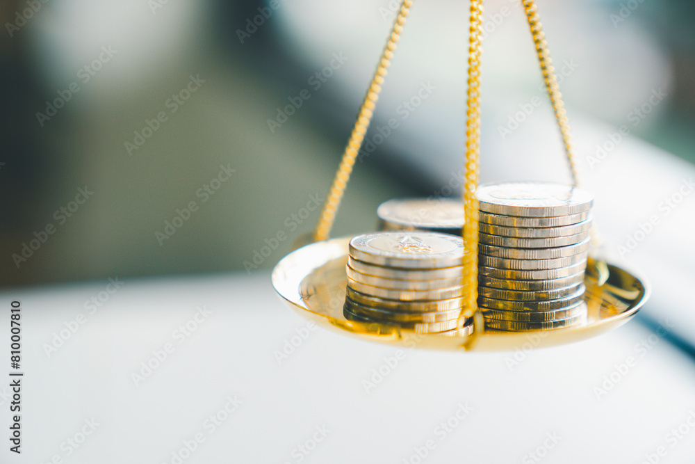 Coins stack with balance scale. Money management, financial plan, time ...
