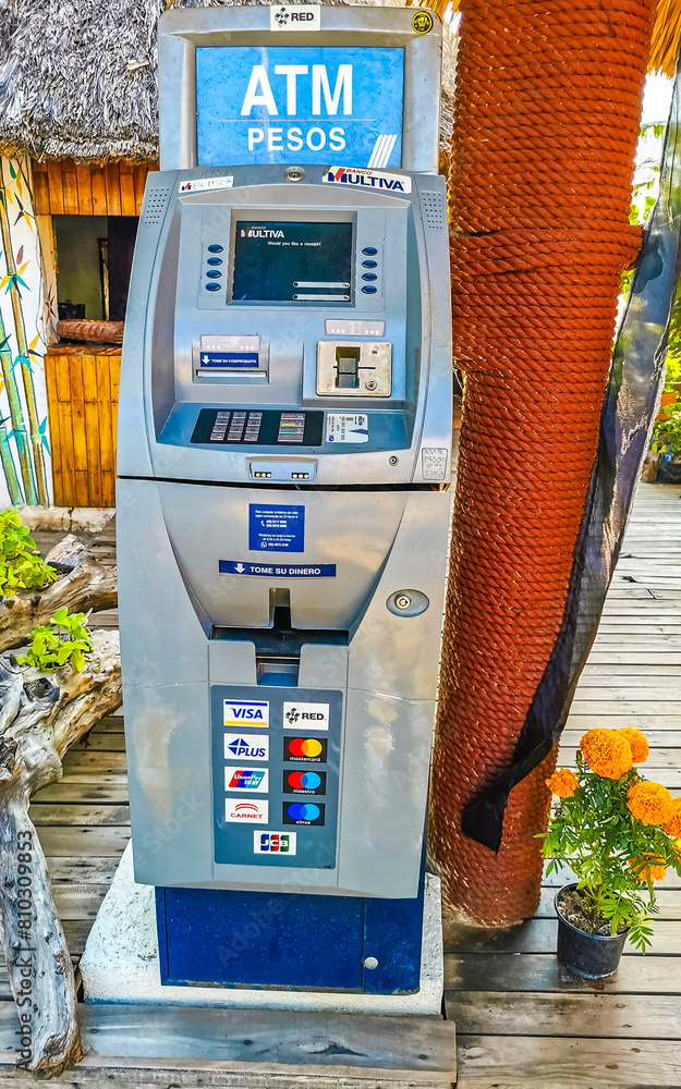 Withdraw Mexican pesos from ATMs in Puerto Escondido Mexico. Stock ...