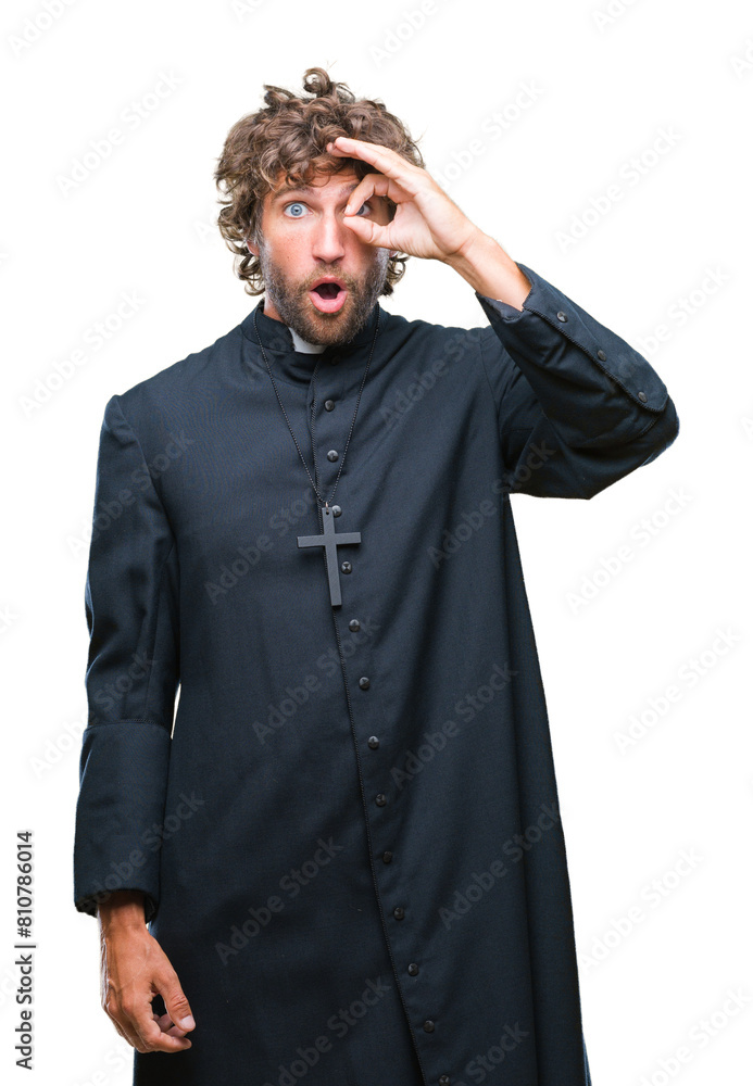 Handsome hispanic catholic priest man over isolated background doing ok ...