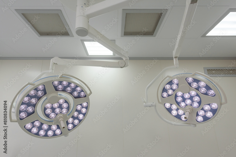 LED surgical lamp. Shadowless lamp shines in the operating room or ...