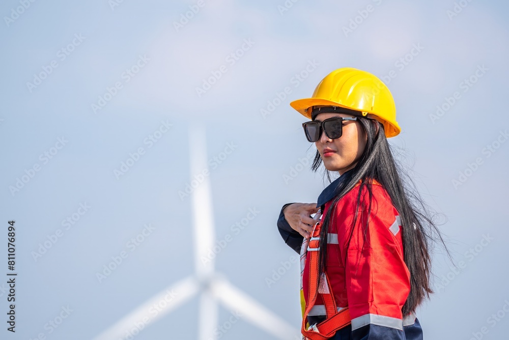 Woman engineer inspection posing check control wind power machine in ...