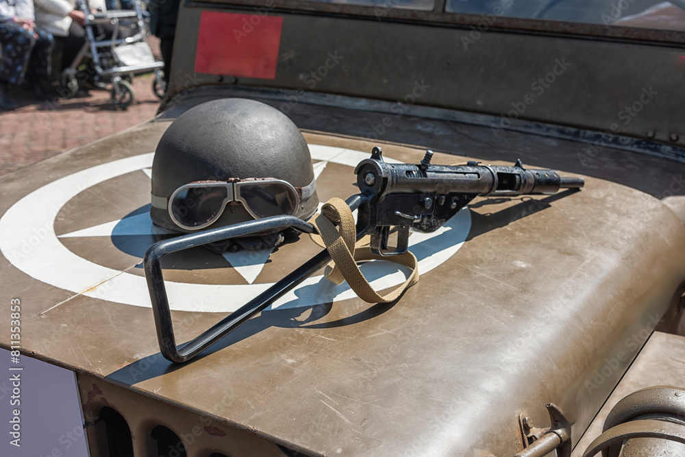 military helmet with goggles and a sten gun from the second world war ...