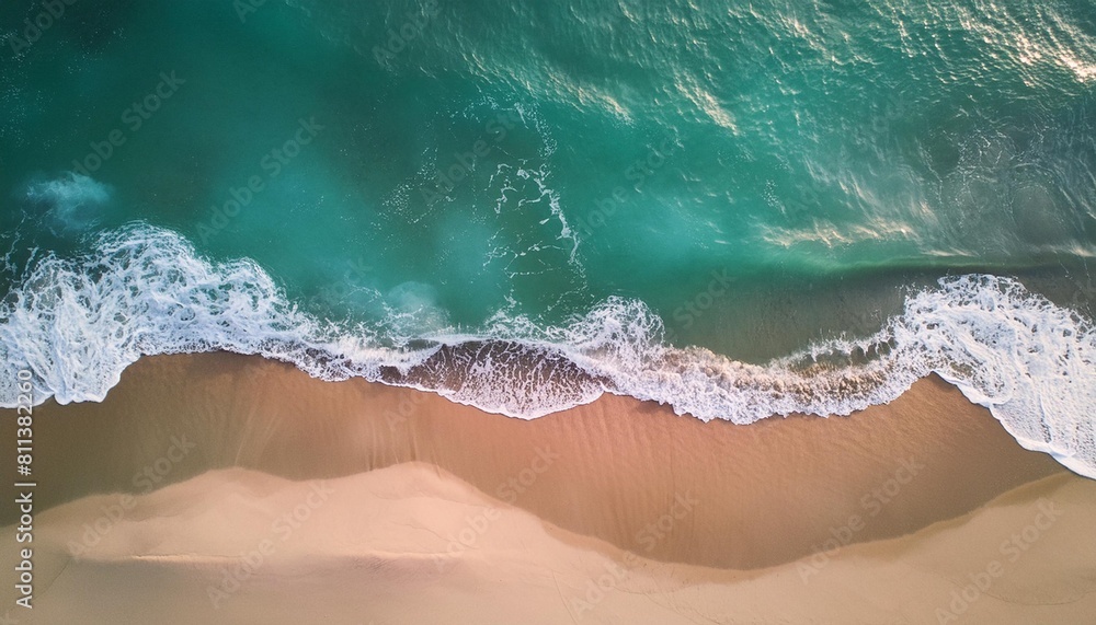 ultrawide shoreline overhead shot showing a shallow wave of water and ...