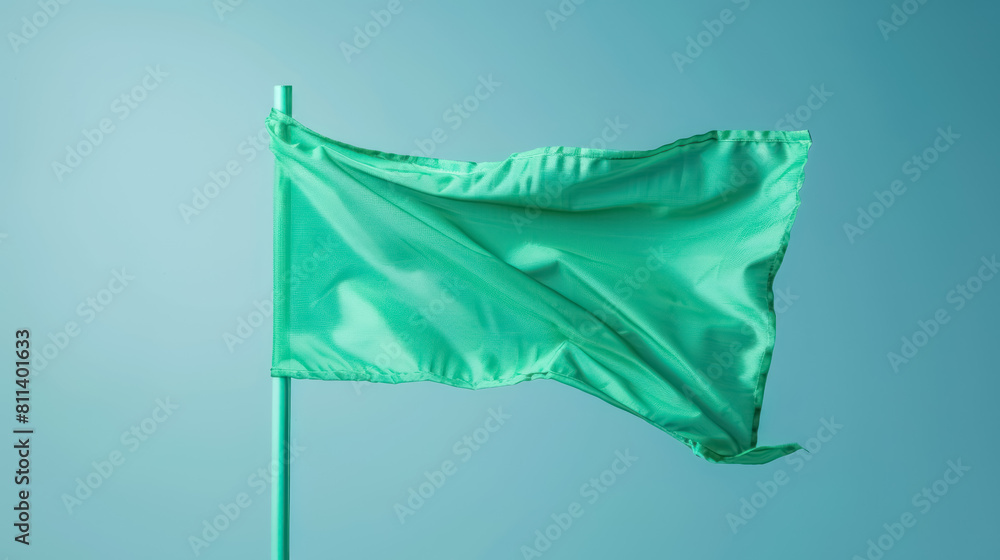 vibrant green racing flag waving on soft blue background for sports and ...