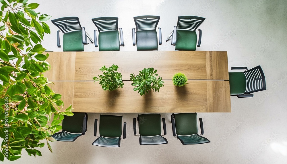 Top view of a modern conference room with a long table, chairs and ...
