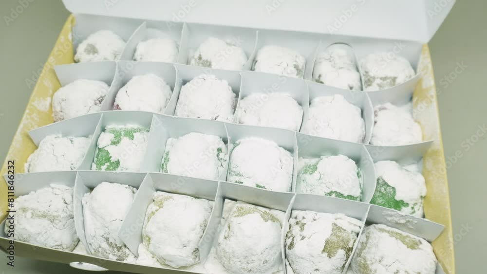 Mochi variants of various colors and flavors such as Pandan, Chocolate ...