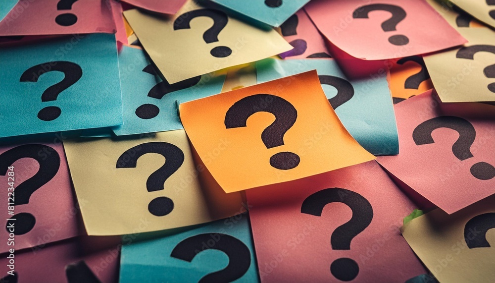 Foto de a pile of colorful post it notes with question marks on them ...
