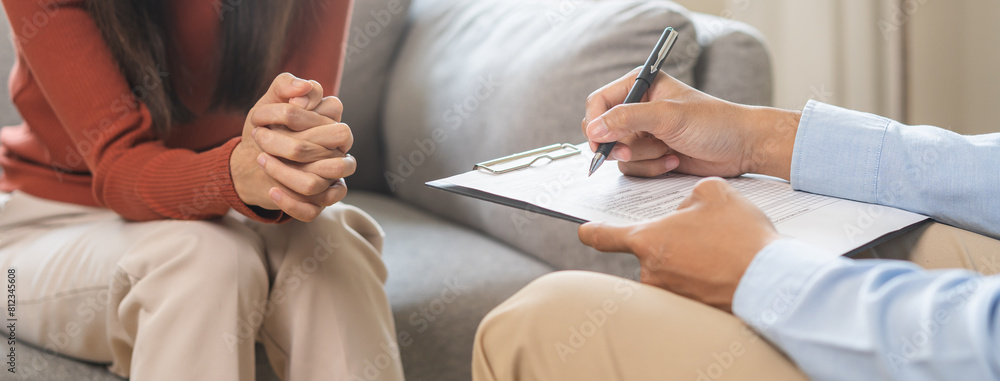 Psychology, depression. Sad asian young woman consultation with ...