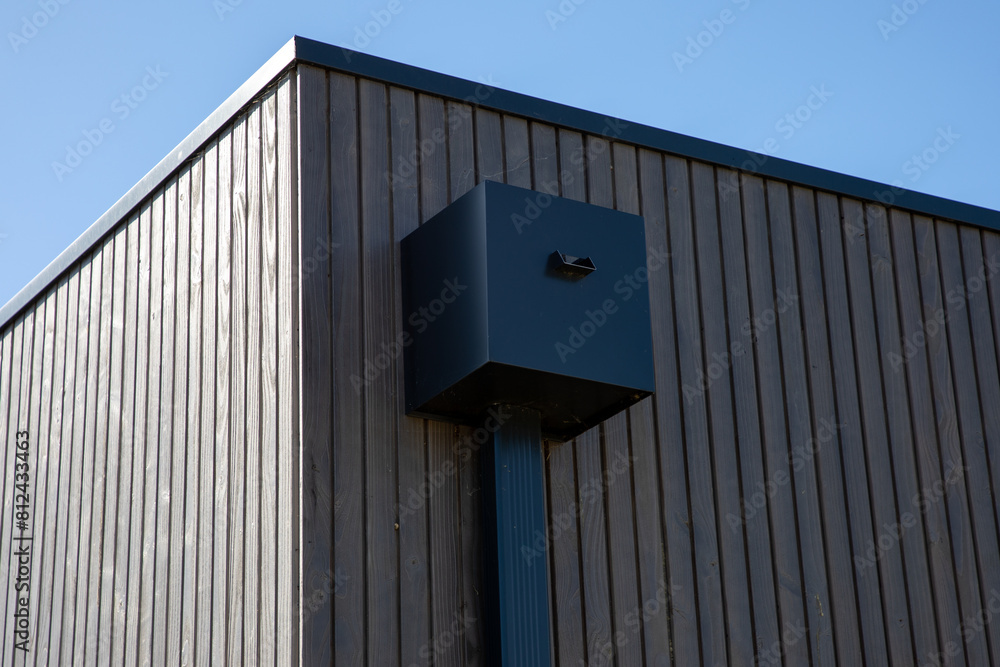 Roof grey gutters aluminum and soffit on gray facade house Stock Photo ...