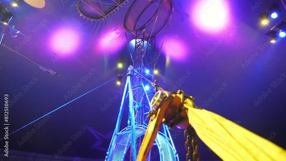 A huge empty rotating wheel of death for acrobats performing under the ...