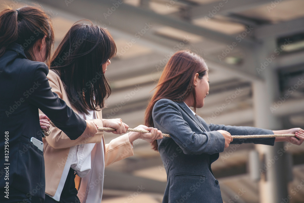 Tug of war Businesswoman Team holding hands together partnership leader ...