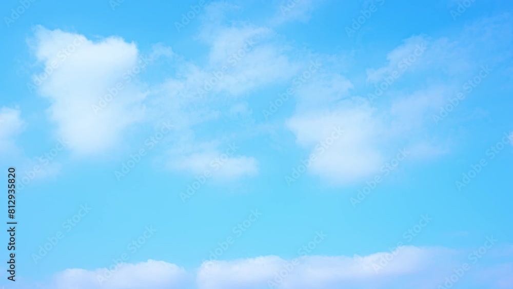 Majestic clouds billow and drift in a seamless time lapse, painting a ...