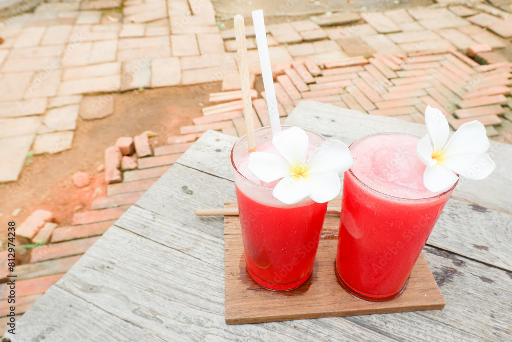 Watermelon smoothie with plumeria flowers, Fresh watermelon juice with ...