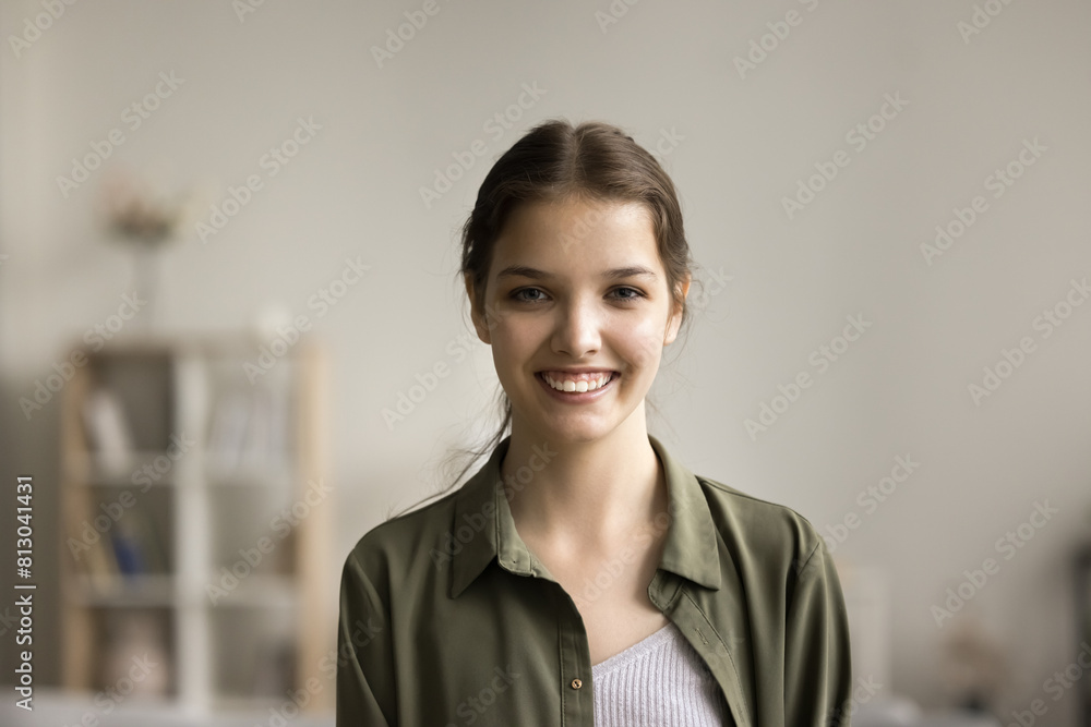 Happy beautiful teenager girl home indoor head shot portrait. Cheerful ...