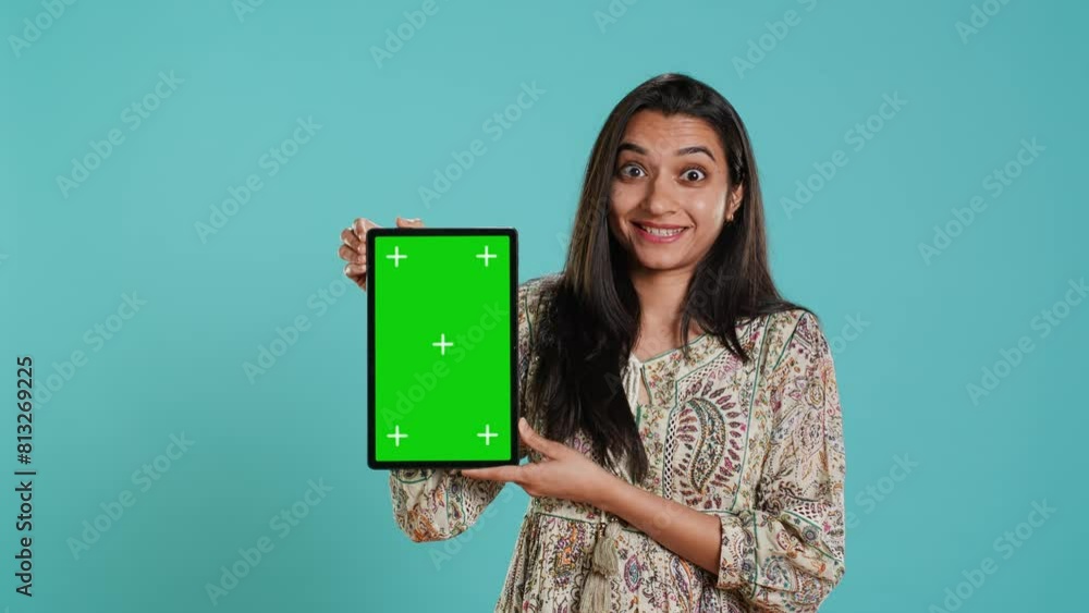 Portrait of indian woman doing influencer marketing using green screen ...