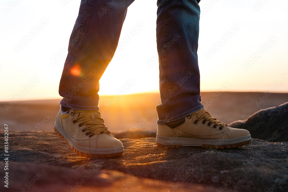 feet of man in special boots reaching destination and on top of ...