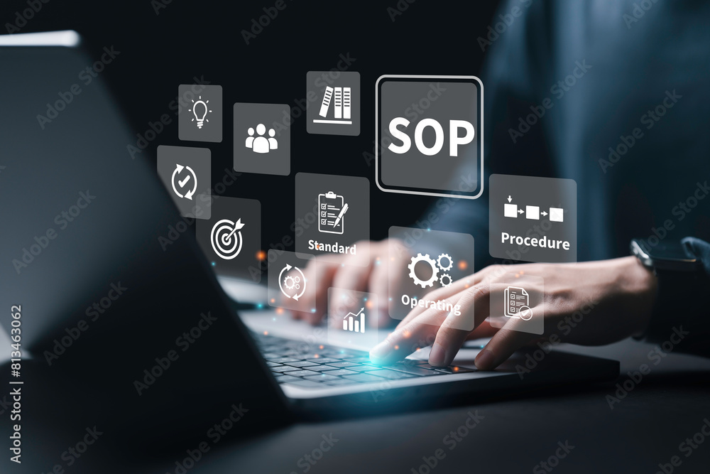 SOP Standard Operating Procedure business concept. Businessman using a ...