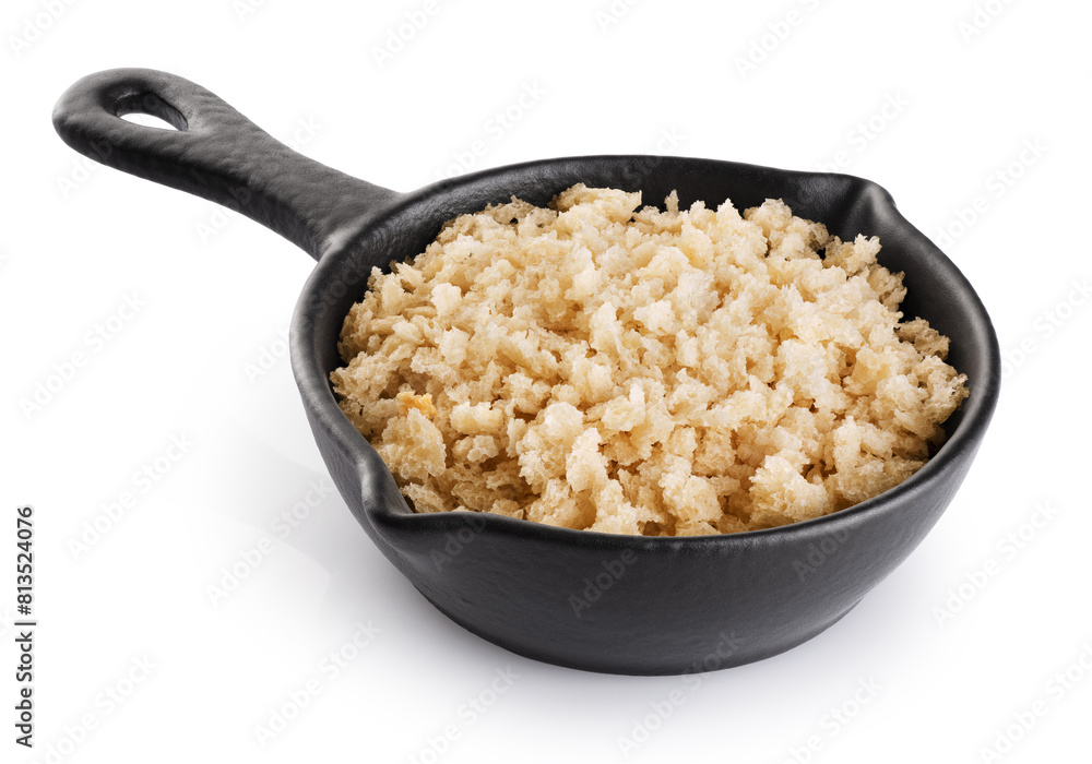 Panko bread crumbs in a sauce pan isolated on white background. With ...