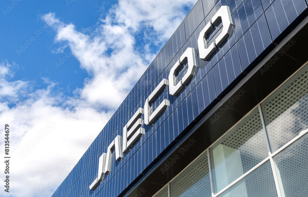 Official dealership sign of Jaecoo on the wall of the office building ...