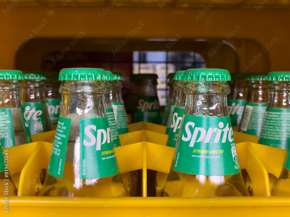 Germany Berlin May 11, 2024. A row of green bottles of Sprite are lined ...
