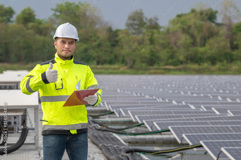 Engineer working at floating solar farm,checking and maintenance with ...