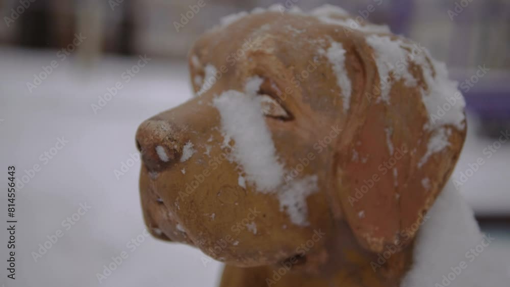Chinese New Year yellow earth dog. Monument to the dog at the railway ...