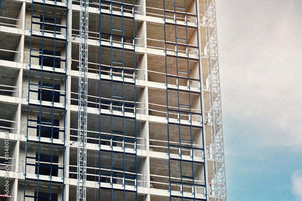 Building under construction, installing aluminum frame support for ...