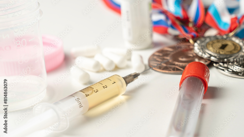 Athletes' medals against the background of doping. Doping for an ...
