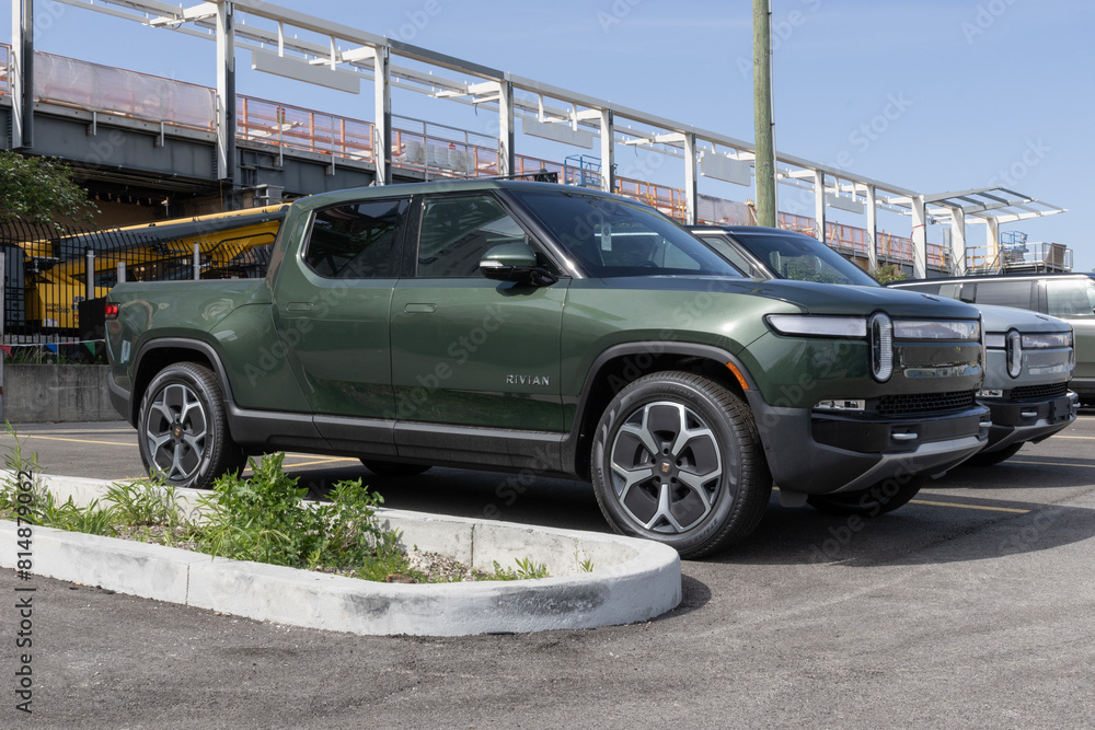Rivian R1T pickup truck display. Rivian offers the R1T in Adventure ...