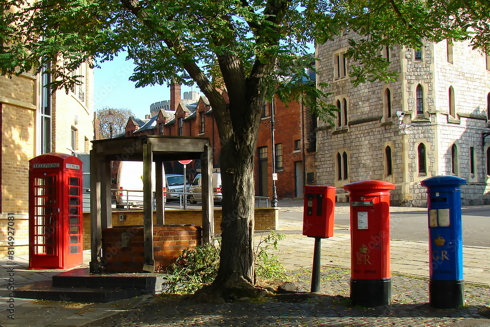 traditional British post boxes with royal ciphers and a red outdoor ...