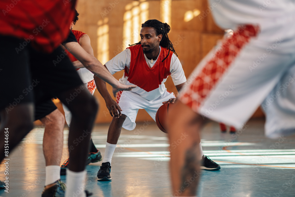 Muslim arabic professional basketball player with dreadlocks dribbling ...