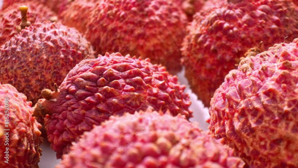 Captured up close, lychees command attention with their fiery red skins ...