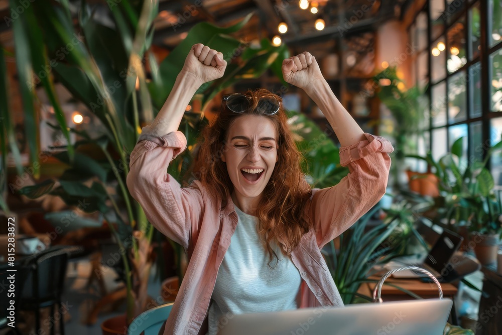 overjoyed female freelancer celebrating new job laptop in hand success ...