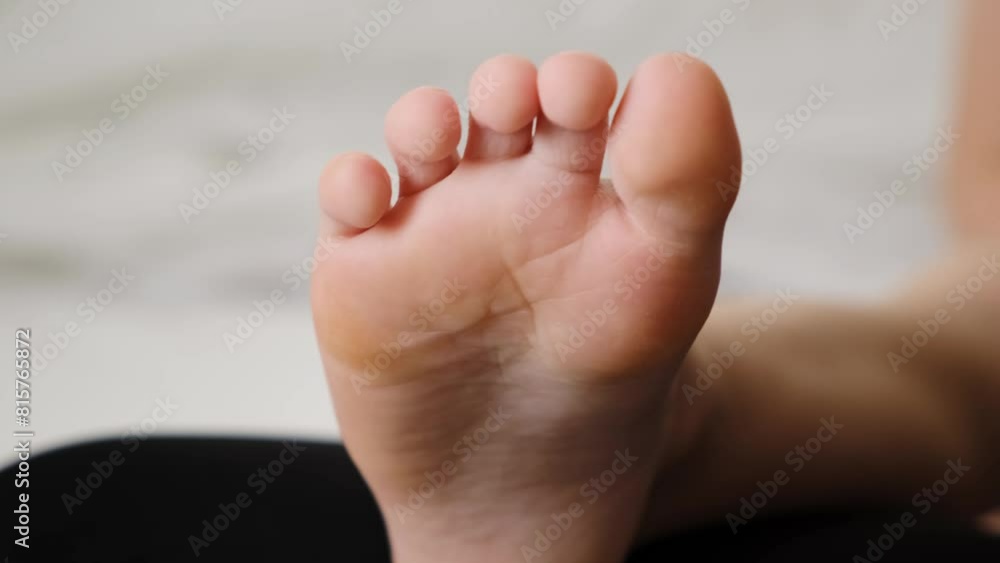 The foot of child close-up. Small tender healthy sole of kid. Beautiful ...