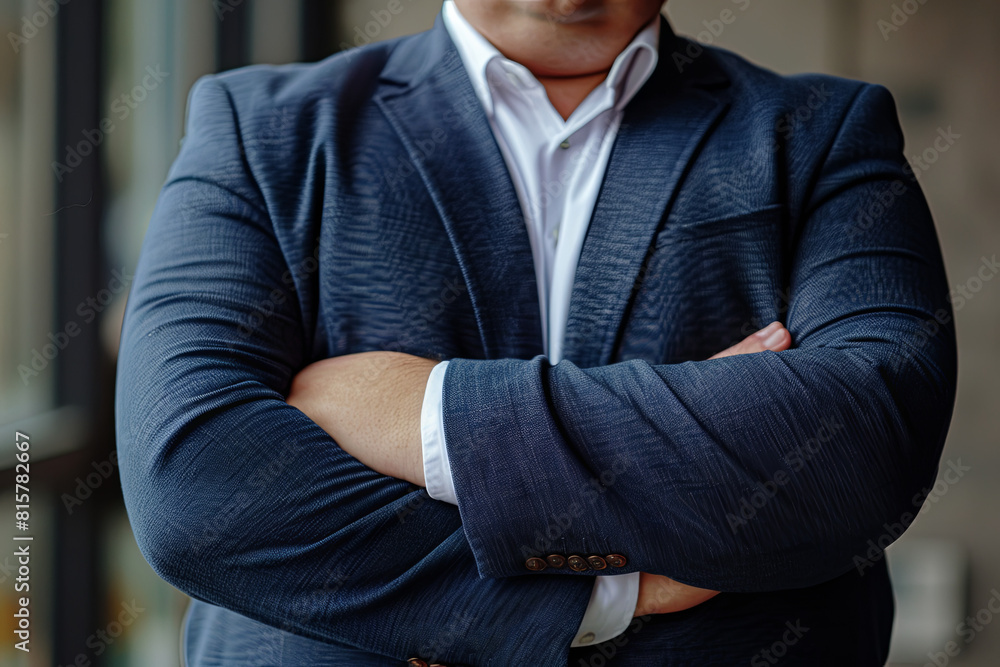 Confident, successful businessman of larger stature showcasing his ...