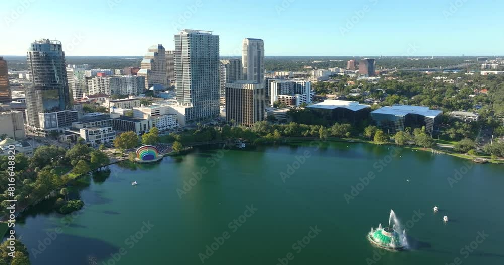Orlando, Florida city architecture. Lake Eola Park and high-rise office ...