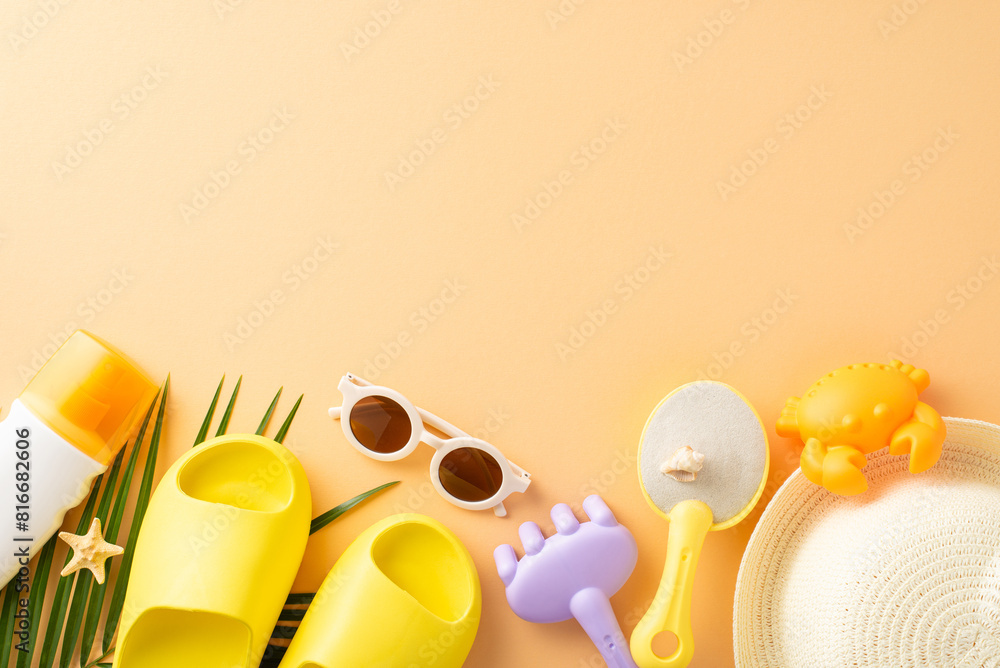 Summer beach fun set-up for kids: top view of shovel, rake, molds of ...