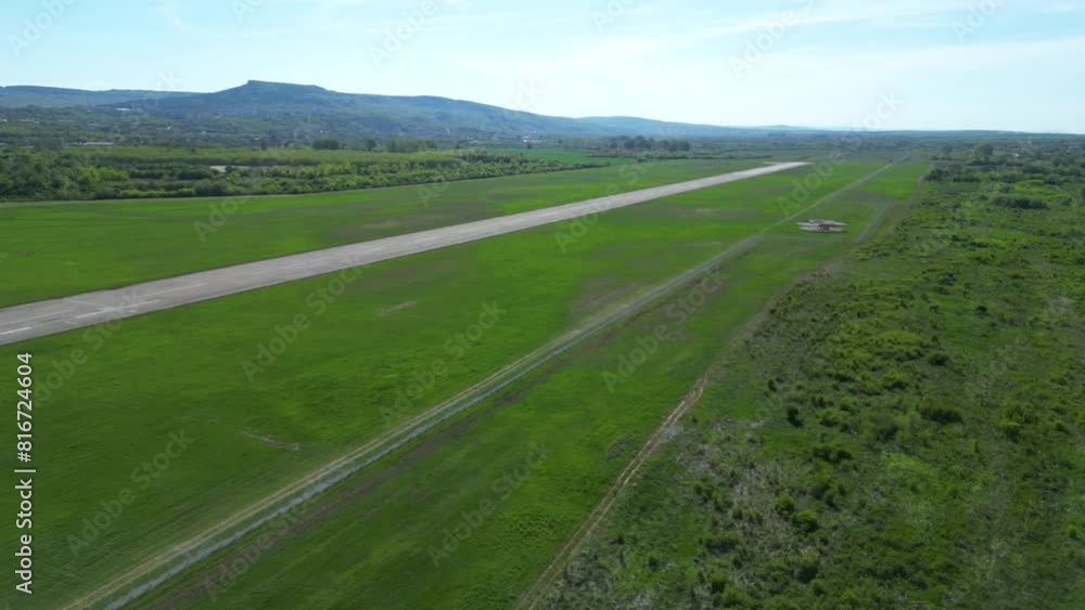 Aerial footage of rural airport runway taxiway and ramp. Airfield ...