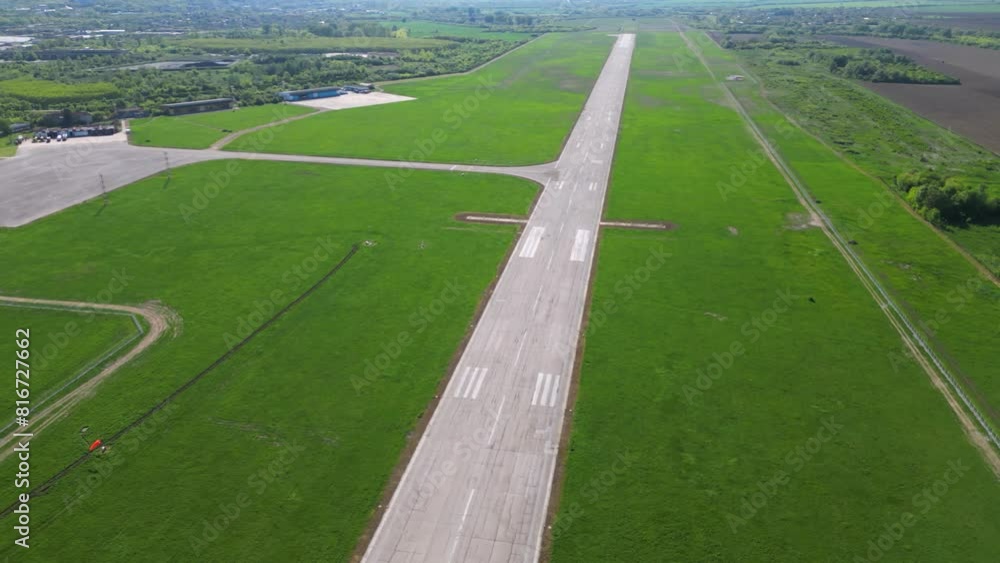 Aerial footage of rural airport runway taxiway and ramp. Airfield ...
