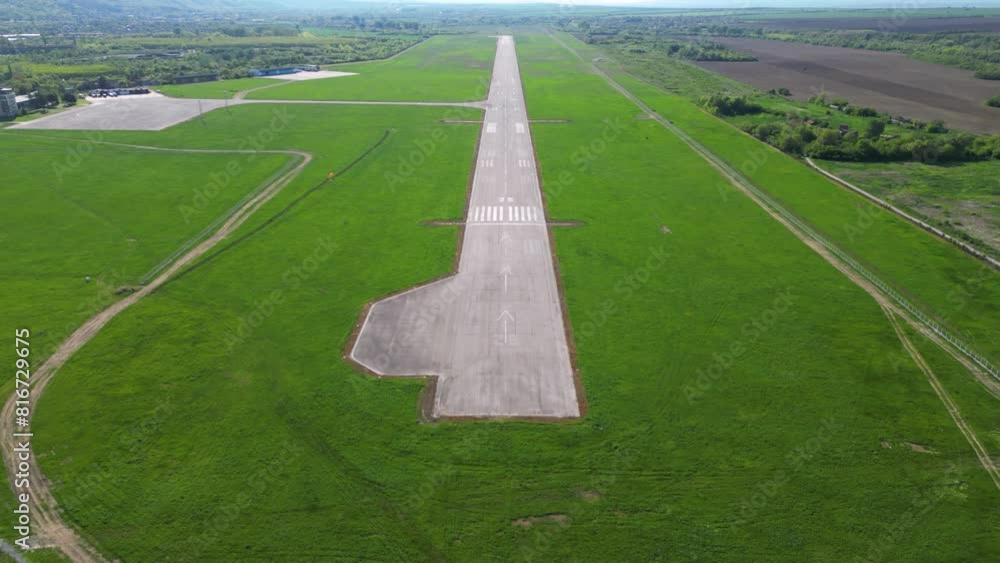 Aerial footage of rural airport runway taxiway and ramp. Airfield ...